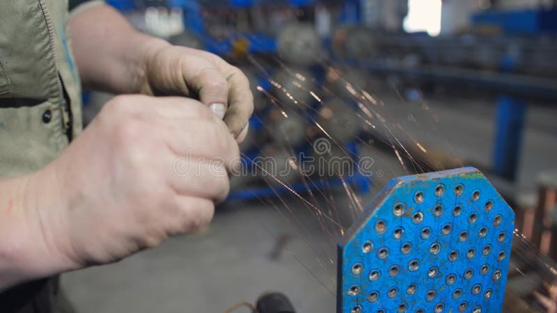 Male Worker Fixes a Problem on Drawing Line Copper Wire. the Plant ...