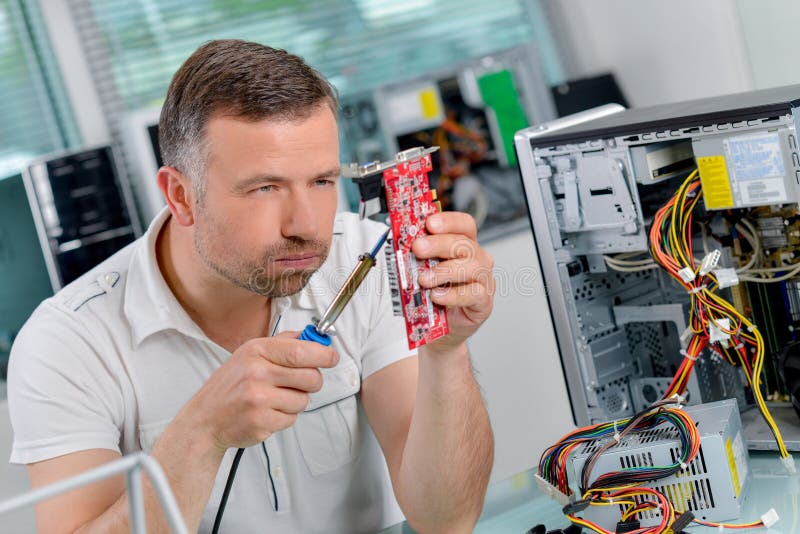 Male Worker Fixing Computer Stock Image - Image of board, chip: 294502447