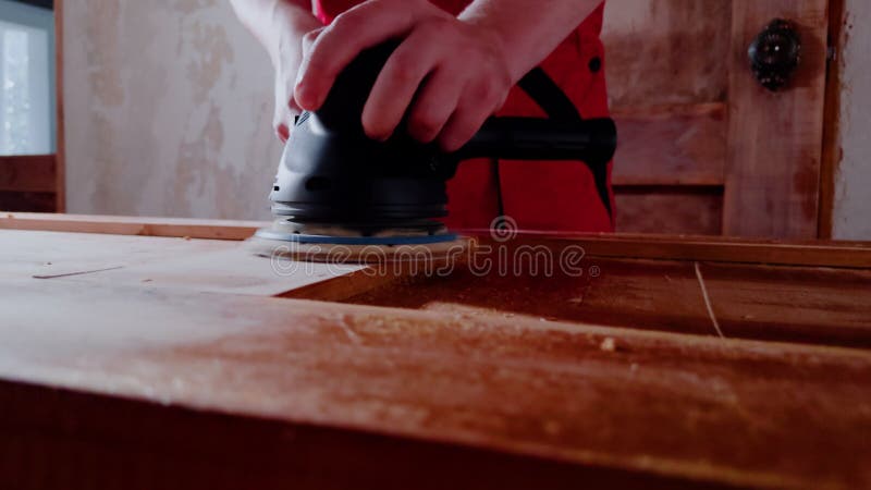 Male Worker with Grinder Performs Sanding in Workshop Stock Footage ...