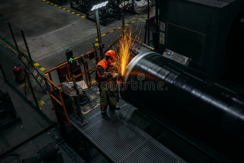 Male Worker Grinding Weld Pipe Editorial Stock Photo - Image of iron ...