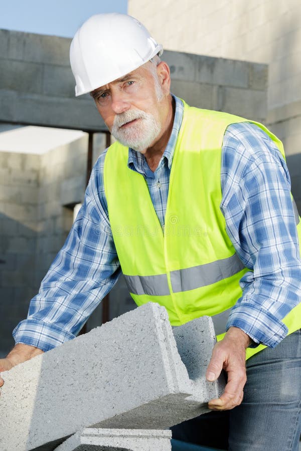 Male Worker Holding Cement Outdoors Stock Image - Image of concrete ...