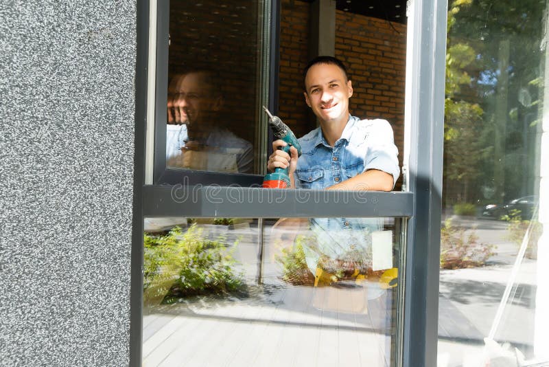 Windows Installation Workers, Worker Window in a Building Stock Photo ...