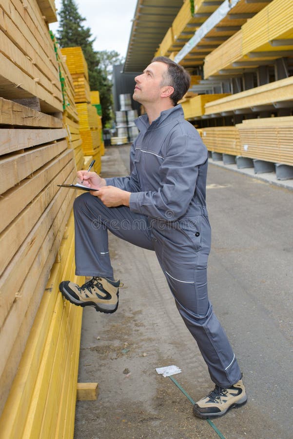 Male Inventory Worker Checking List Stock Image - Image of store, depot ...