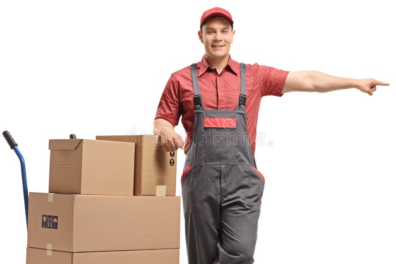 Male Worker Leaning on a Hand Truck with a Stack of Boxes and Pointing ...