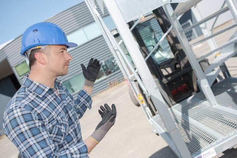 Male worker loading frame stock photo. Image of construction - 250114748