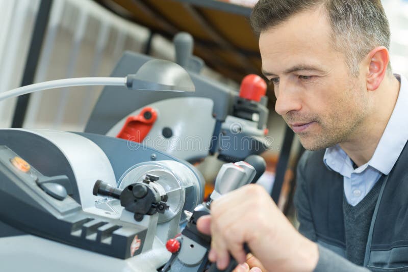 Male Worker Making Keys in Workshop Stock Image - Image of exact ...