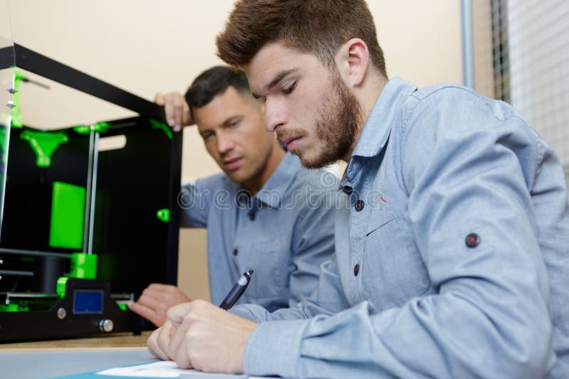 Male Worker Making Notes by 3d Printer Stock Photo - Image of ...