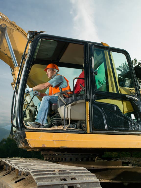 Male Worker Operating Excavator Stock Photo - Image of driver, drive ...