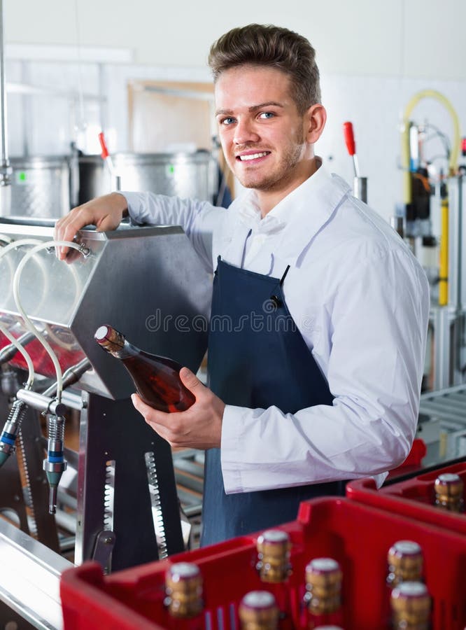Male Worker Packaging Wine Bottles at Sparkling Wine Factory Stock ...
