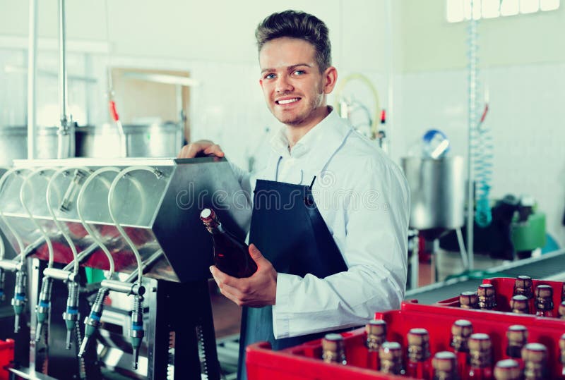 Male Worker Packaging Wine Bottles at Sparkling Wine Factory Stock ...