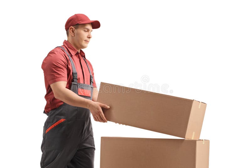 Male Worker Placing a Box on Top of a Stack Stock Photo - Image of ...