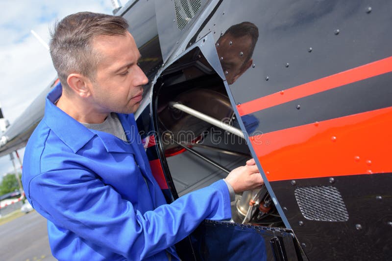 Male Worker Preparing Chopper Stock Image - Image of duty, vehicle ...