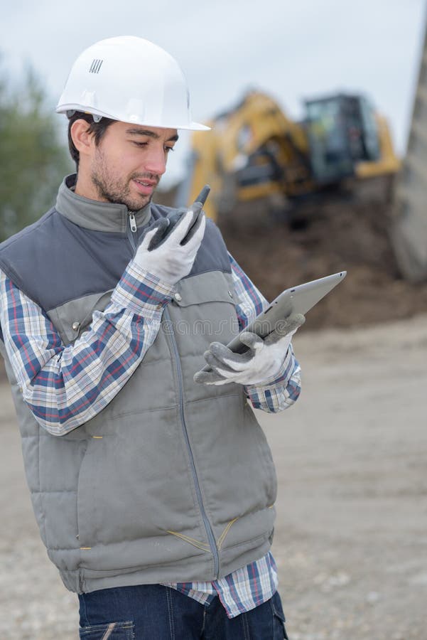 Male worker reading tablet stock photo. Image of civil - 256656560