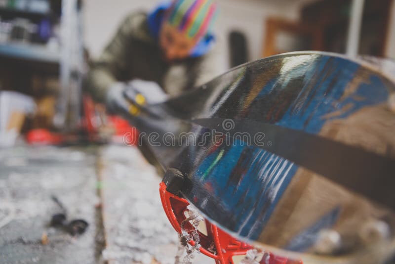 Male Worker Repairing Stone, Edge Sharpening in Ski Service Workshop ...