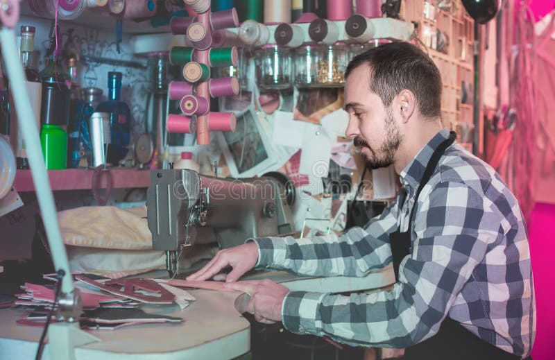 Male Worker Sewing Stitches on Belt in Leather Workshop Stock Image ...