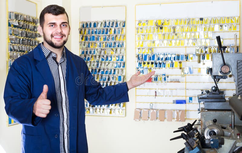 Male Worker Showing His Tools for Making Keys in Workshop Stock Image ...