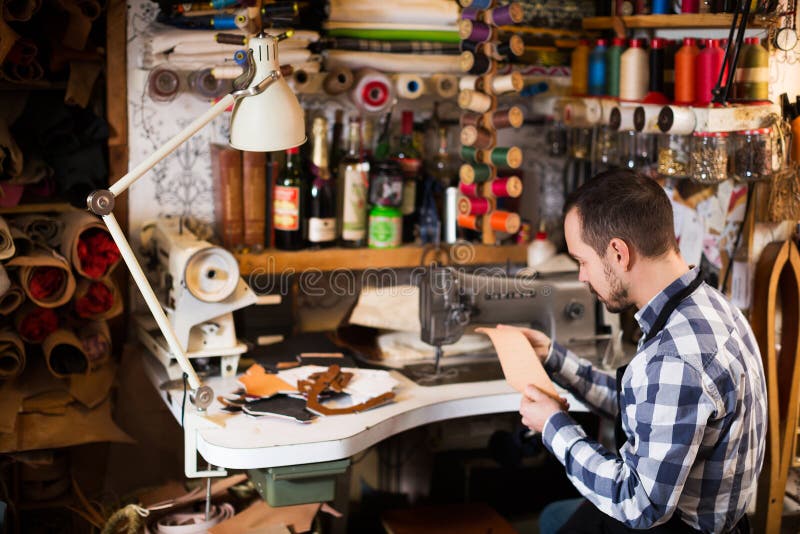Male Worker Stitching New Belt Stock Photo - Image of person ...