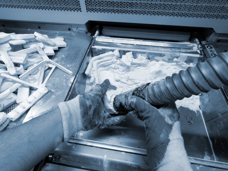 Worker Taking Out Models of White Polyamide Powder and Cleaning Them ...