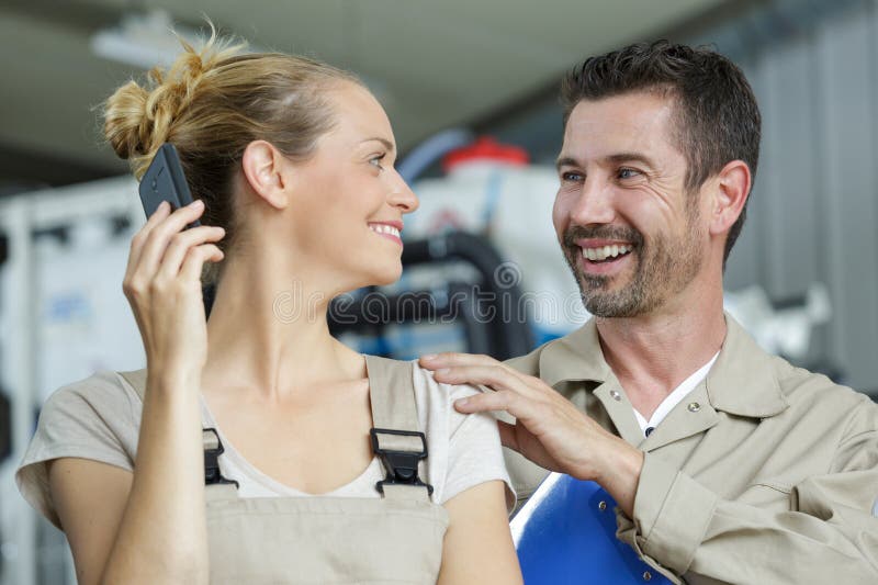 Male Worker Tapping Female Colleague on Shoulder Stock Photo - Image of ...