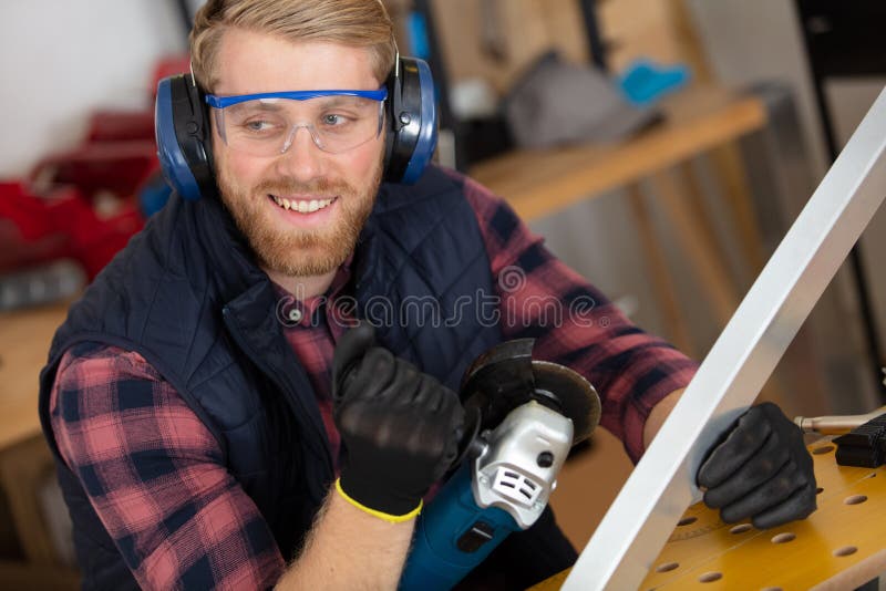 Male Worker Using Angle Grinder Stock Image - Image of craftsman, metal ...