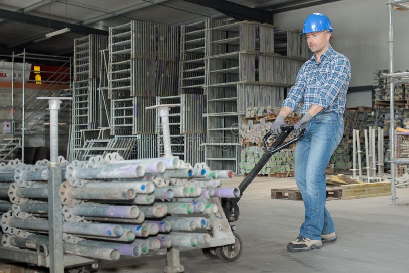 Male Worker Using Pull Cart Stock Photo - Image of safety, safe: 171368850