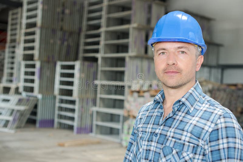 Male worker in warehouse stock image. Image of company - 160409619