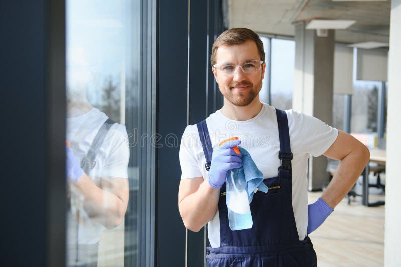 Male Worker Washing Window Glass Stock Photo - Image of detergent ...