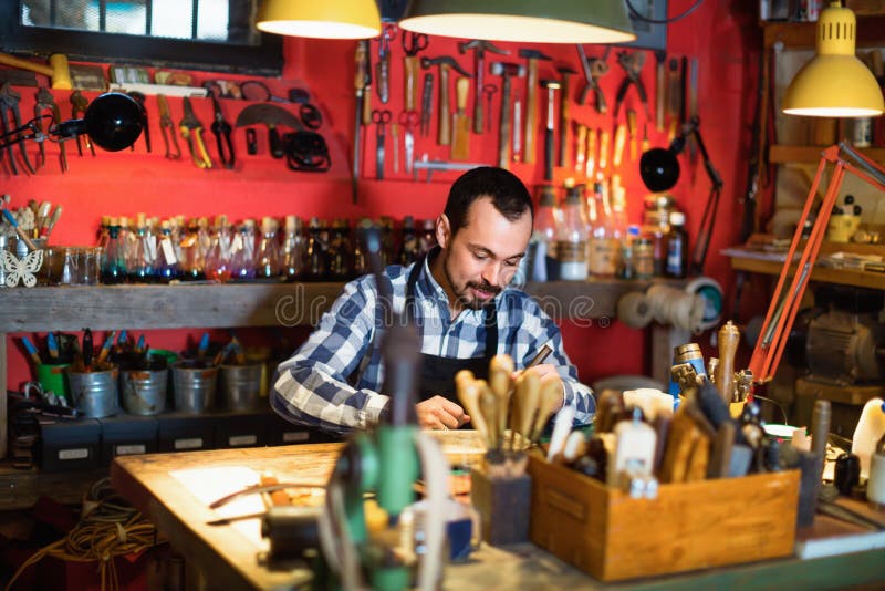 Male Worker Working on Leather for Belt in Leather Stock Image - Image ...