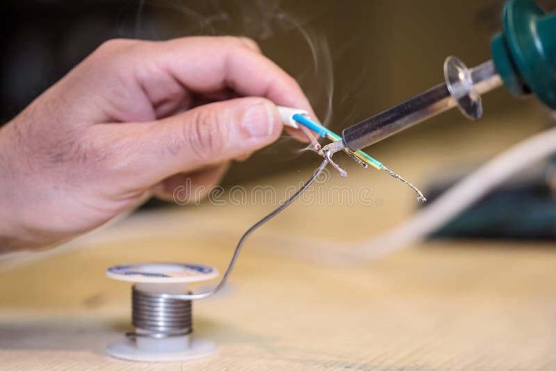 Male Worker Works with Solder Wire Stock Image - Image of technician ...