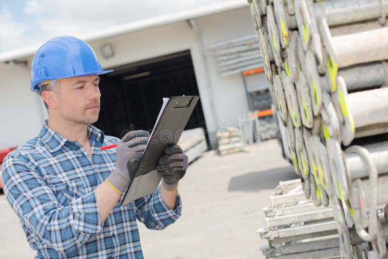 Male Worker Writing Inventory Stock Photo - Image of rule, imporatant ...