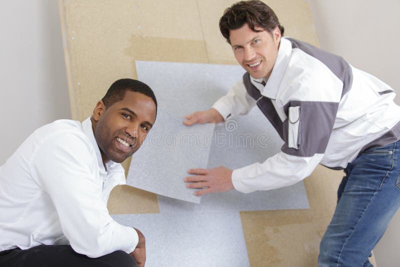 Male Workers during Decorating Work in Room Stock Image - Image of ...