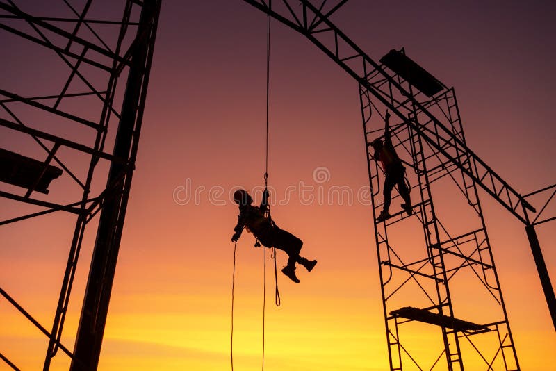 Male Working Abseiling on a Construction Stock Image - Image of ...
