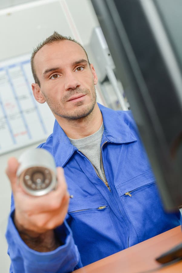 Male workman at computer stock image. Image of browse - 335182151