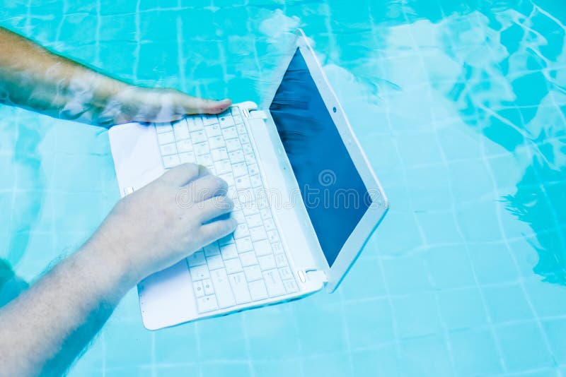 Male Works on Minicomputer Under Water. Minicomputer at the Bottom of ...