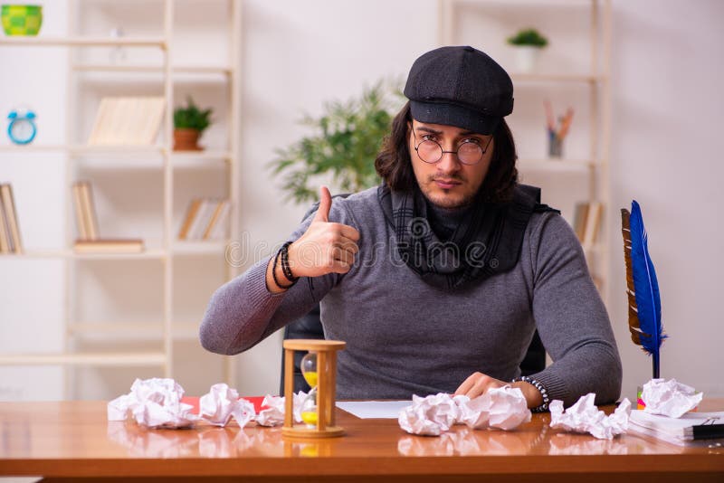 Young Male Writer in Time Management Concept Stock Image - Image of ...