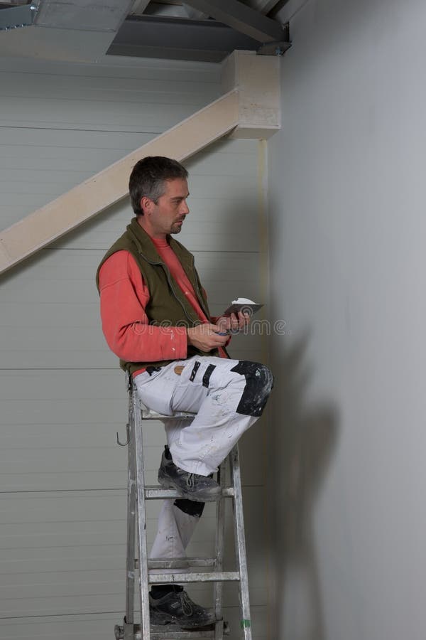 Maler bei der Arbeit stockfoto. Bild von fremdfirma, gebäude - 21643902