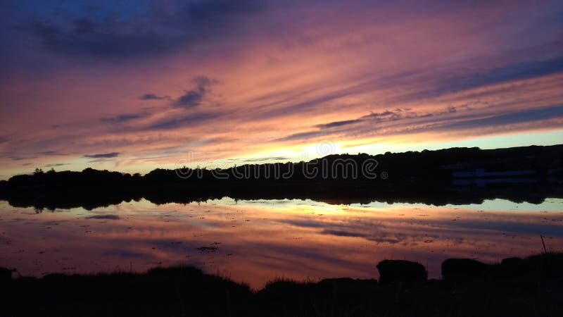 Malin town sunset stock image. Image of sunset, scene - 97242641