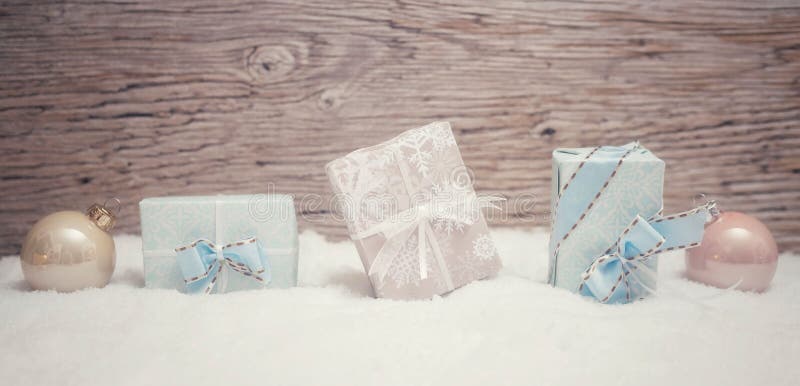 Small Christmas Present Boxes in the Snow Stock Photo - Image of snow ...