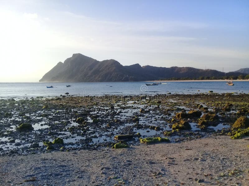 Maluk Beach at the Afternoon Stock Image - Image of reflection ...