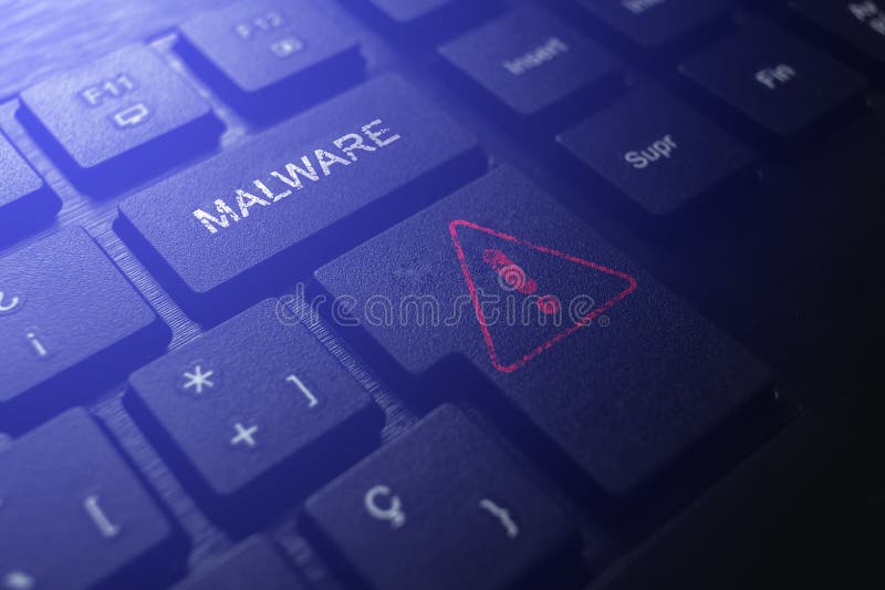 Cyber Security Concept. Malware Text on Keyboard with Warning Sign ...