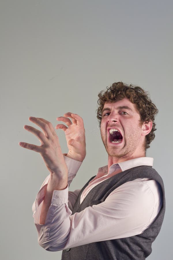 Man Acting Like Animal stock photo. Image of silly, finger - 62556480