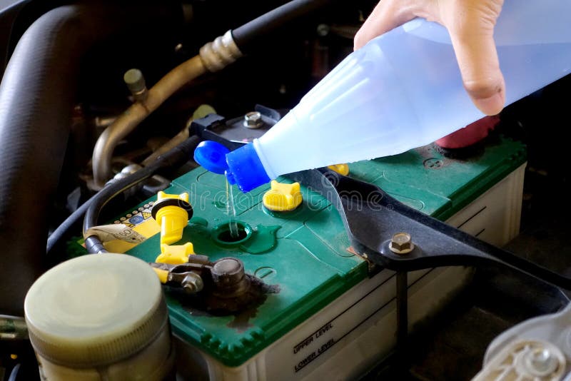 The Man are Add Distilled Water Stock Photo - Image of battery, pack ...