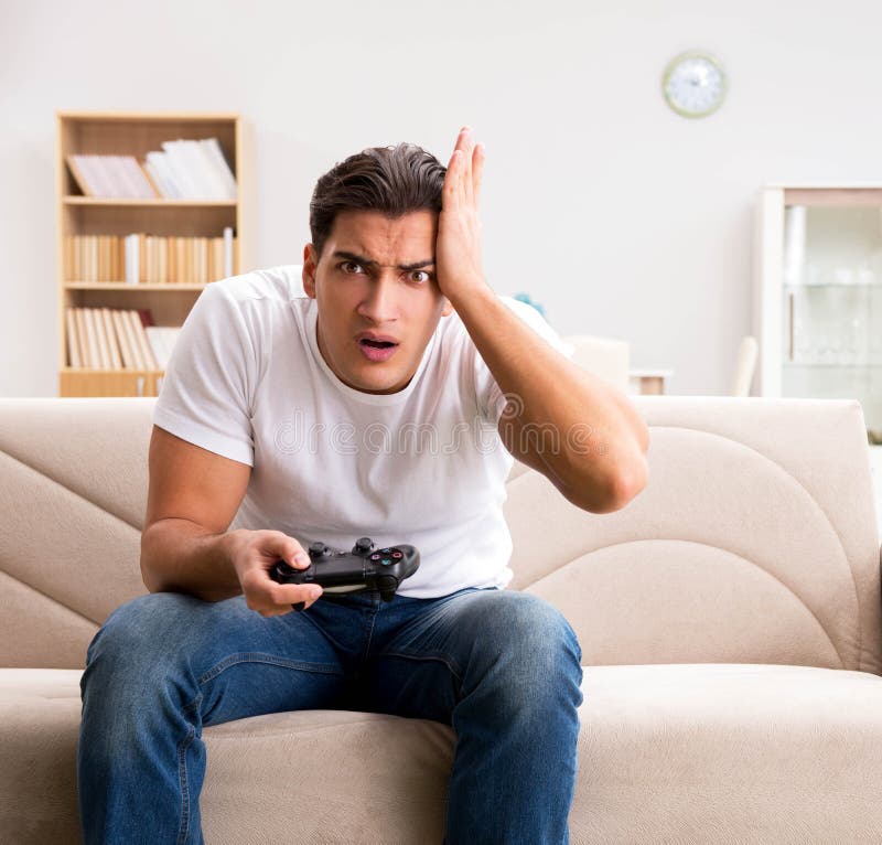 Man Addicted To Computer Games Stock Image - Image of button, couch ...