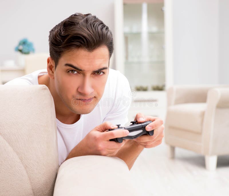 Man Addicted To Computer Games Stock Photo - Image of hiding, control ...