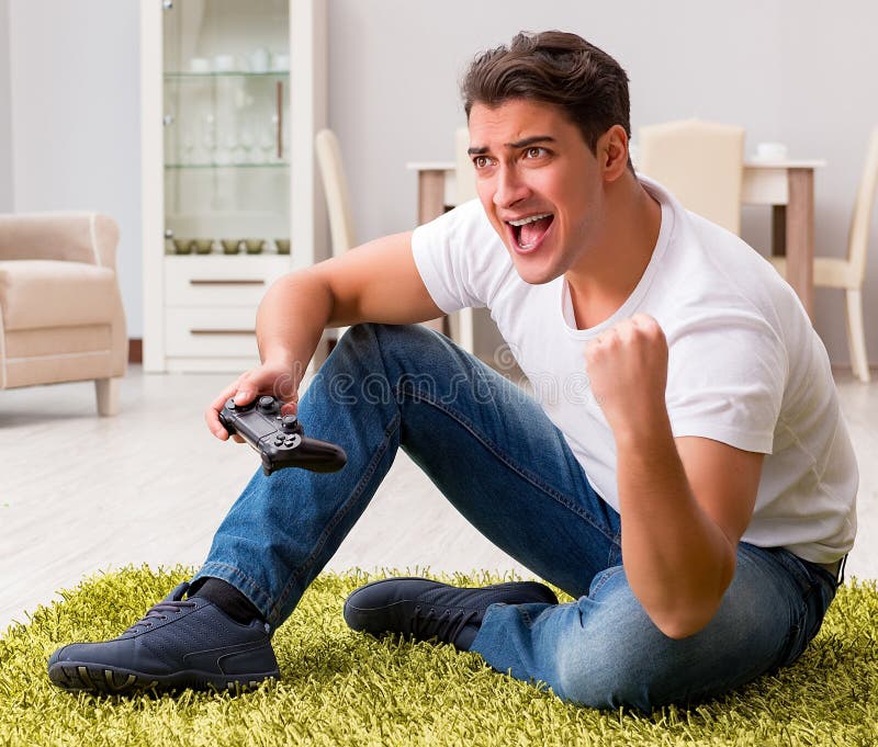 Man Addicted To Computer Games Stock Photo - Image of joystick, couch ...