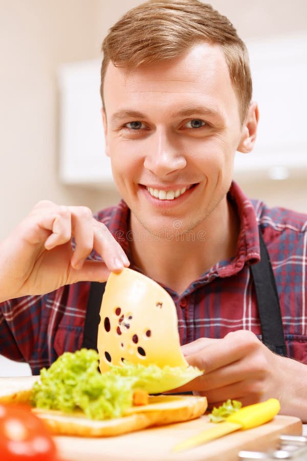 Man Adding Cheese To Sandwich Stock Photos - Free & Royalty-Free Stock ...