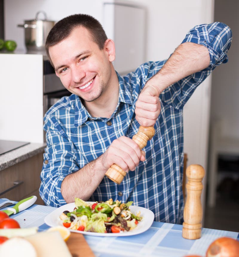 Man Adding Spice To the Salad Stock Photo - Image of green, healthy ...