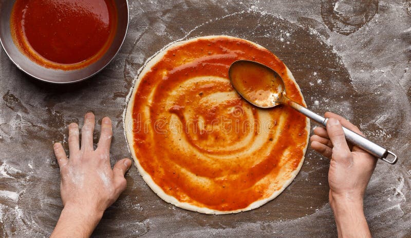 Man Adding Tomato Sauce To Italian Pizza Base Stock Image Image Of Colorful Food 140504081