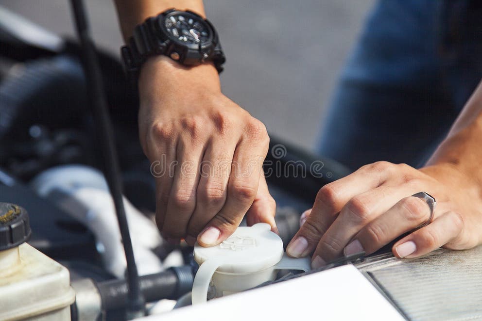 Man Adding Water To Car Radiator Stock Image - Image of breakdowns ...