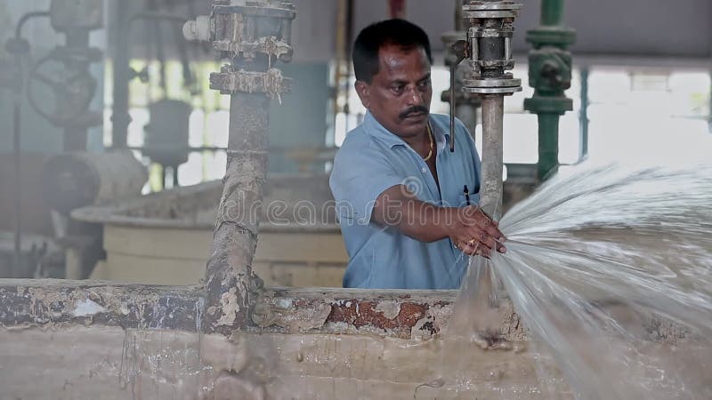 Man Adding Water To Raw Soap Liquid for Chemical Reaction in Bubbling ... Man Adding Water To Raw Soap Liquid for Chemical Reaction in Bubbling ...